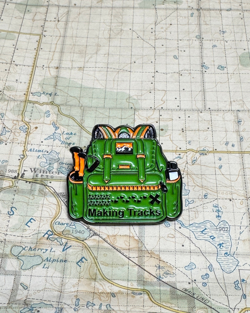 Making Tracks Backpack Pin – Landsharkz